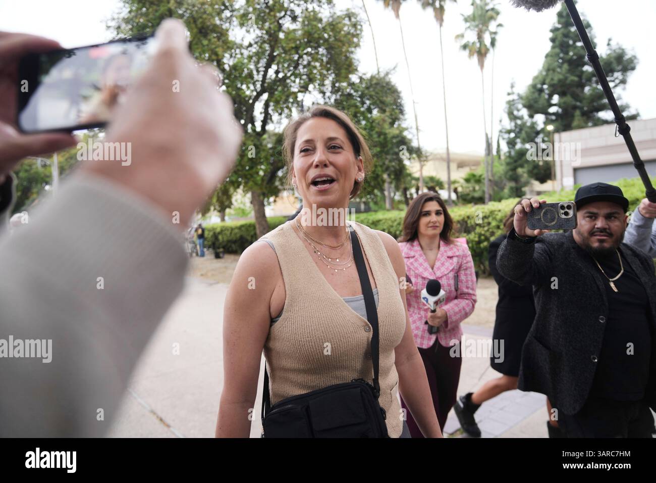 Anamaria Baralt, center, and other family members of Erik and Lyle ...