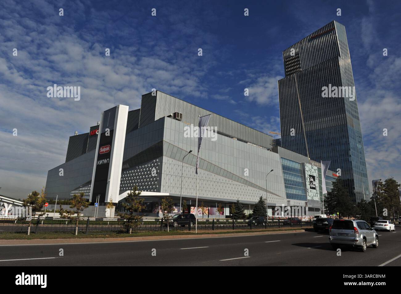 The building of a large shopping center Esentai Mall, with world trade ...