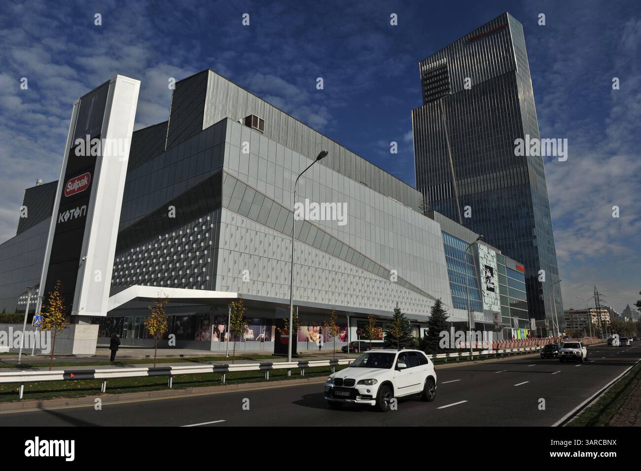The building of a large shopping center Esentai Mall, with world trade ...