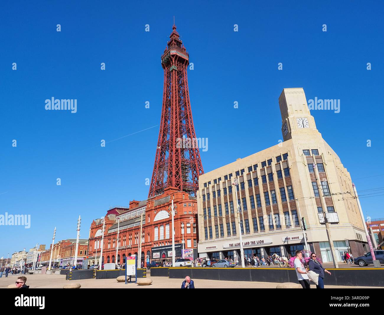 Blackpool, Lancashire, UK, 04-05-2025: Tourists admire the iconic tower ...