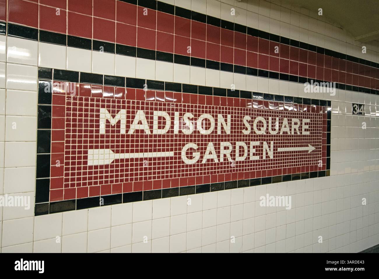 Tiled wall at Madison Square Garden metro station in Manhattan, New ...