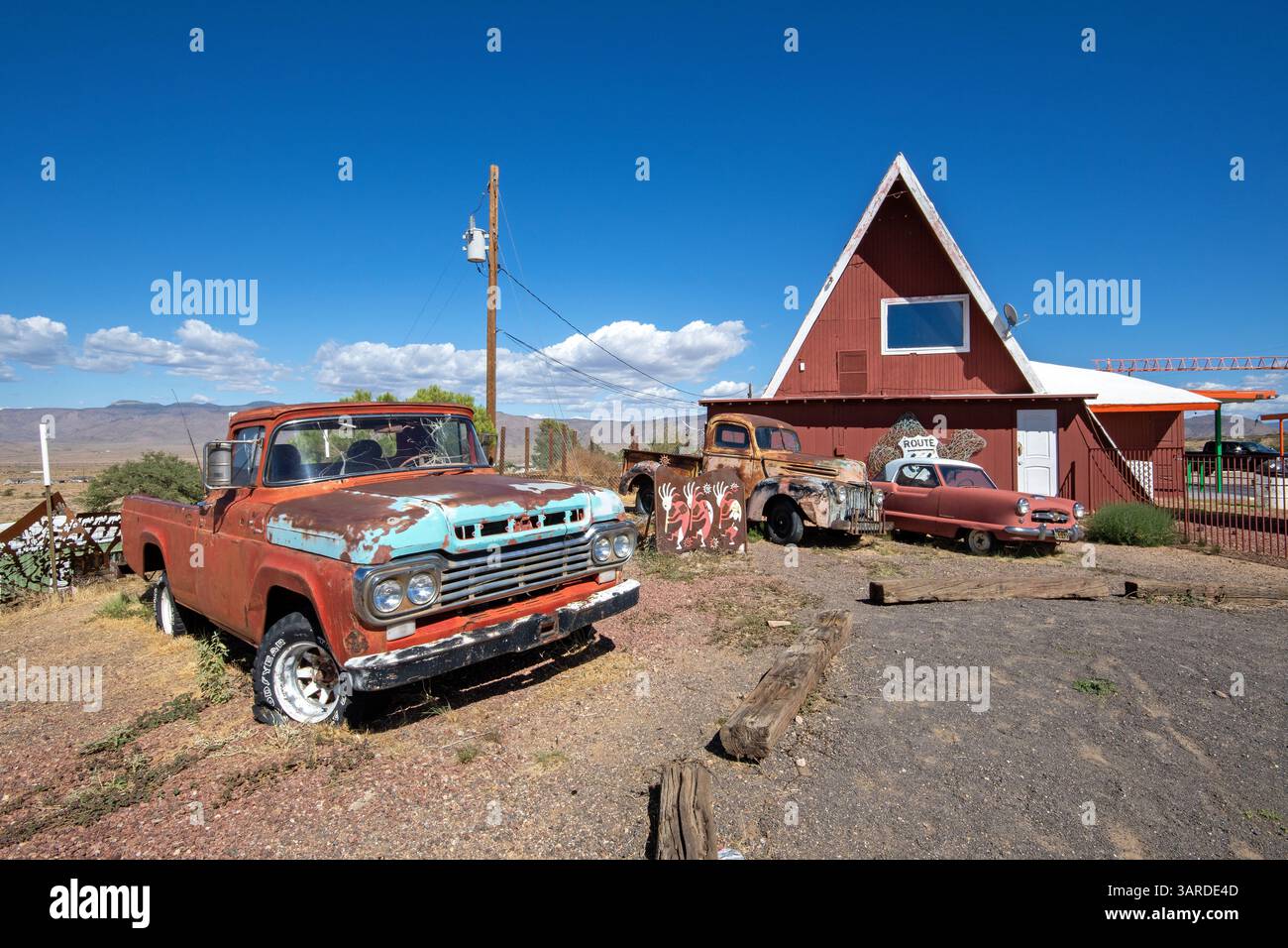 Old cars in Antares Point, former gas station and store along the Route ...