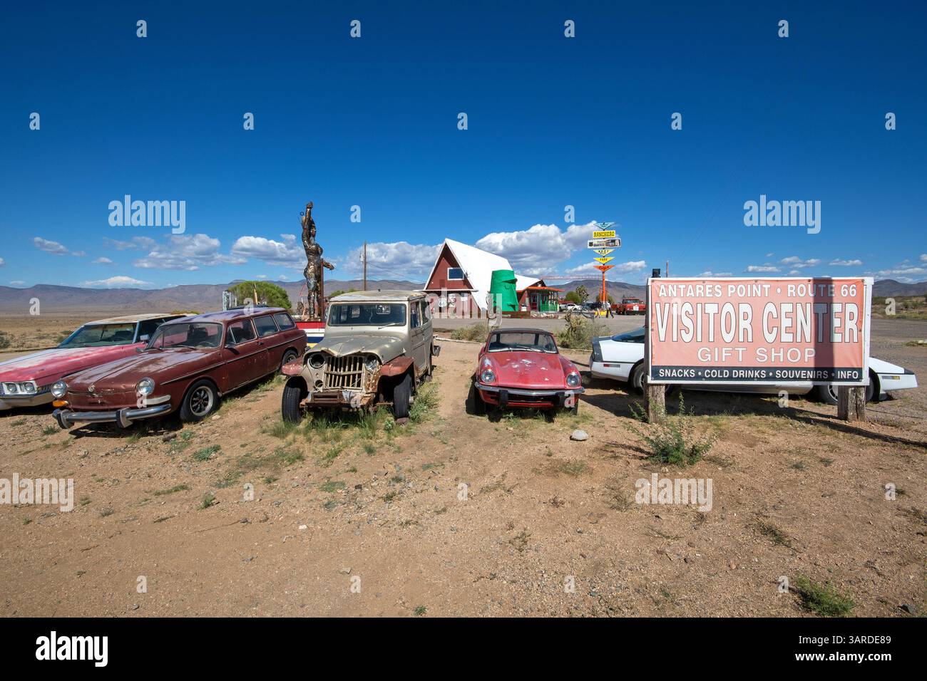 Old cars in Antares Point, former gas station and store along the Route ...