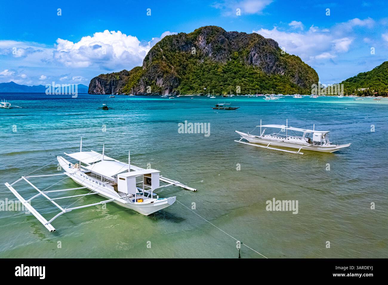Boat at Corong Corong Beach in El Nido in the north of the Palawan ...