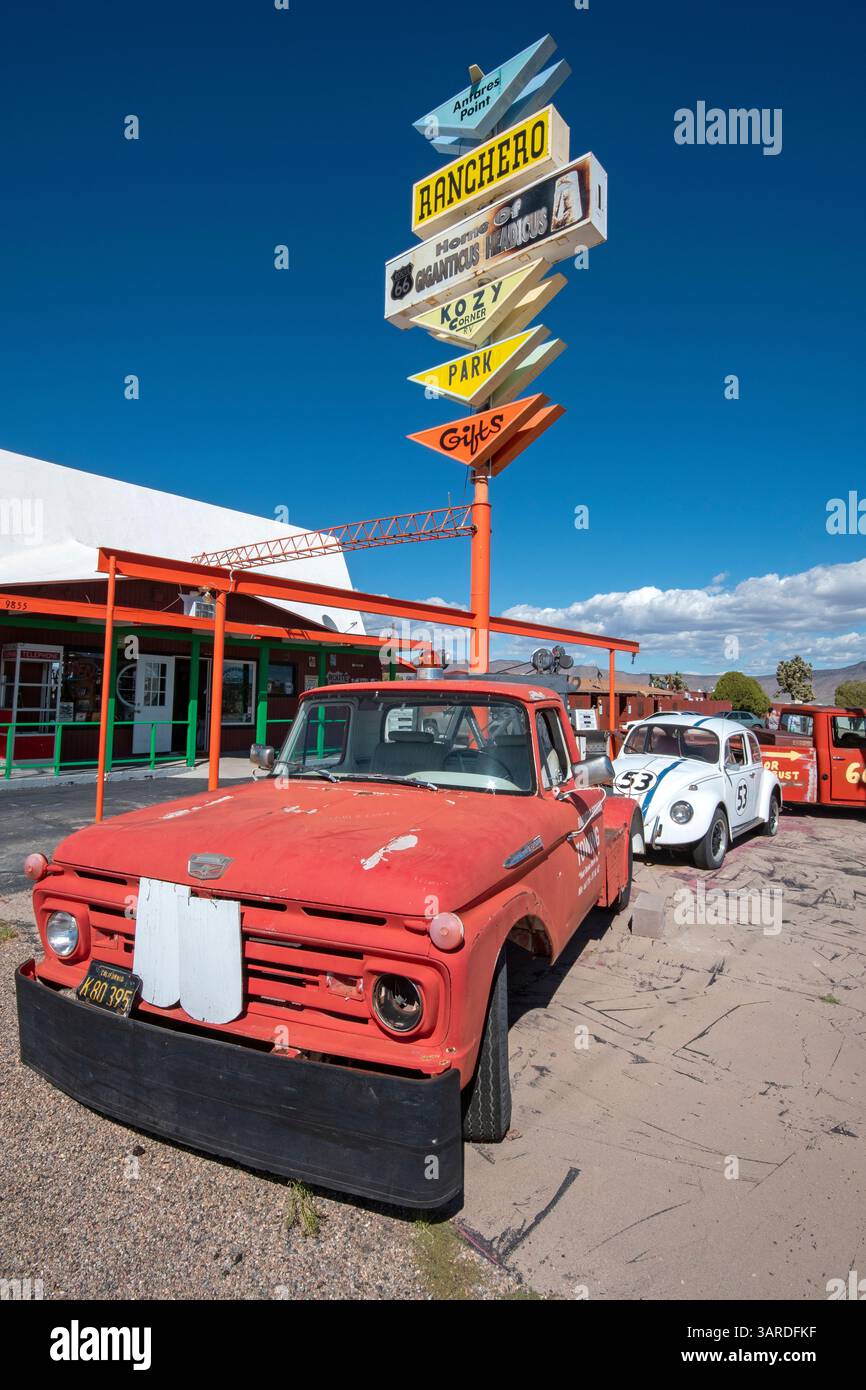 Old cars in Antares Point, former gas station and store along the Route ...