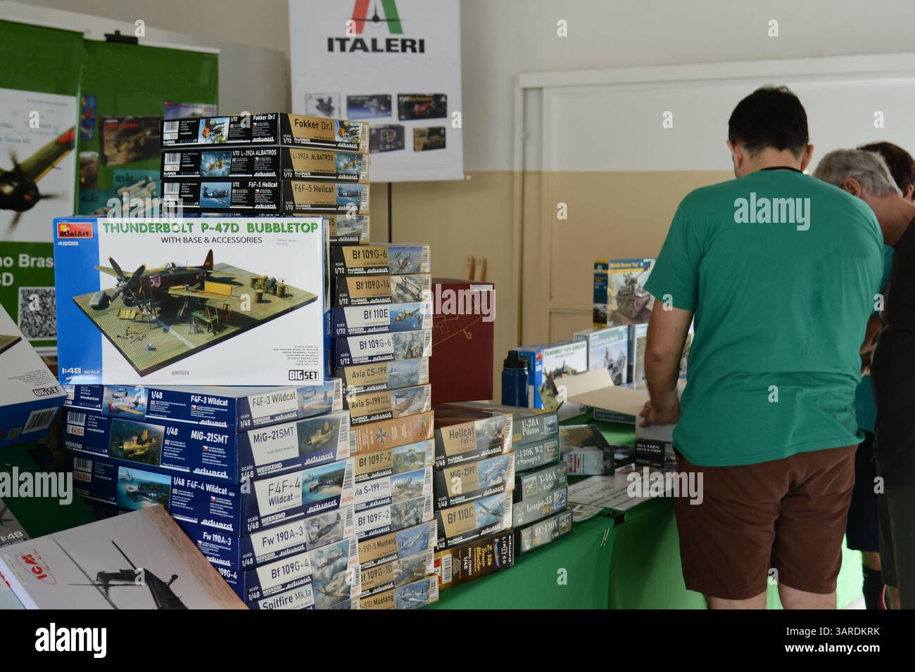 Buyers in a plastic model shop at an exhibition event Stock Photo - Alamy