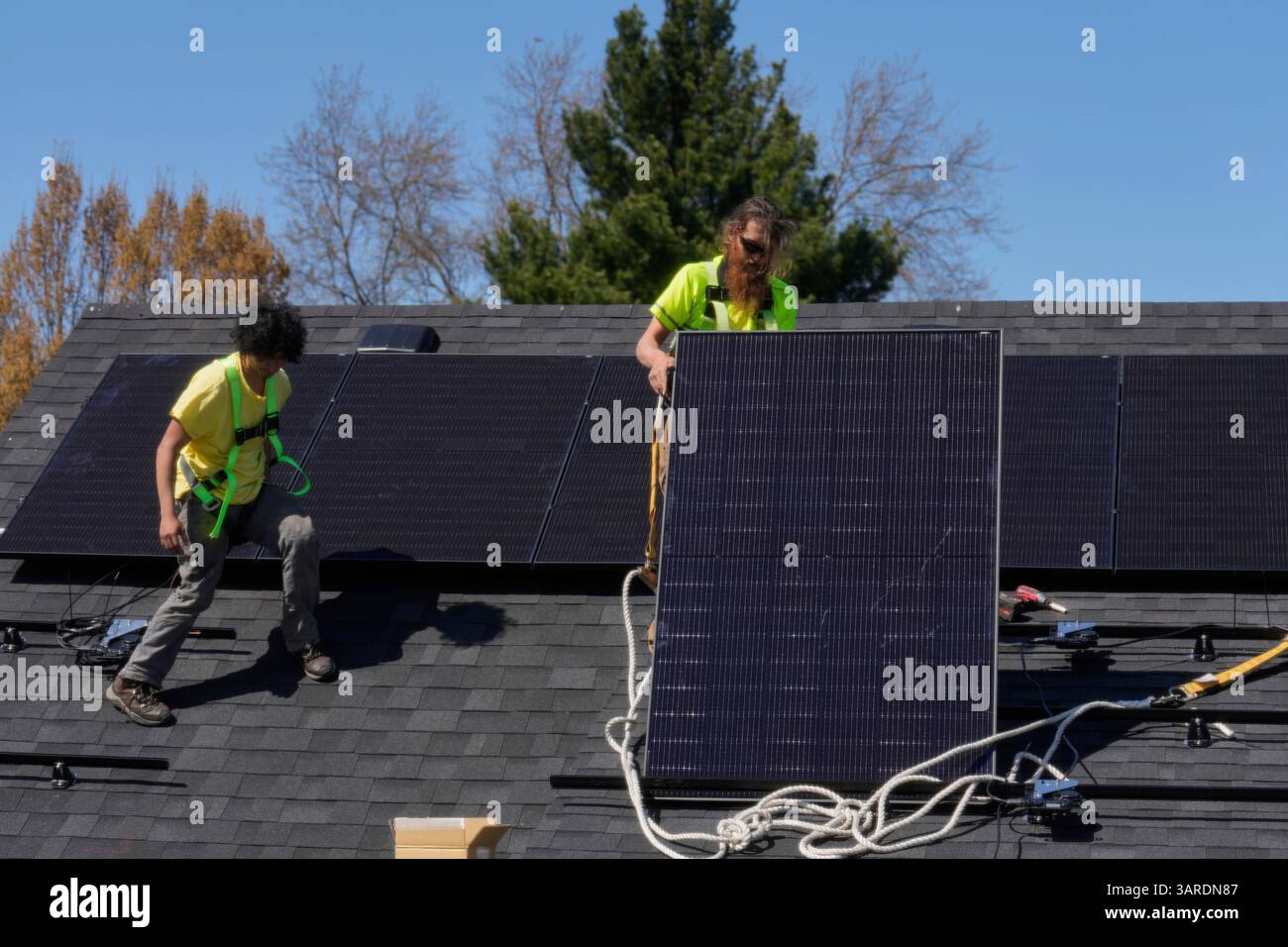 Brayan Santos, left, and Theodore Tanczuk, right, of solar installer ...