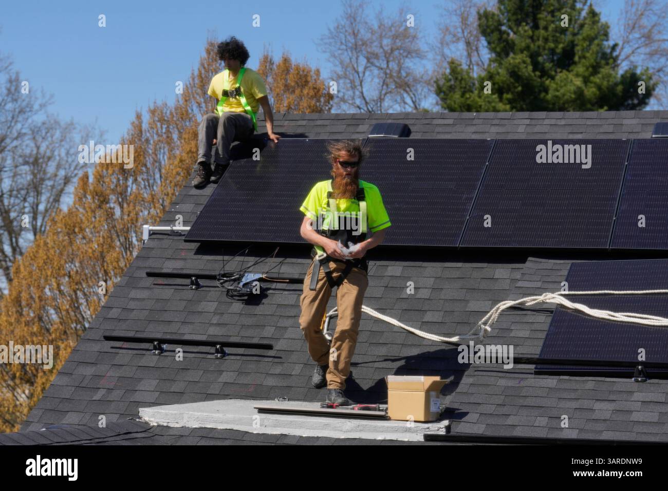 Brayan Santos, left, and Theodore Tanczuk, right, of solar installer ...