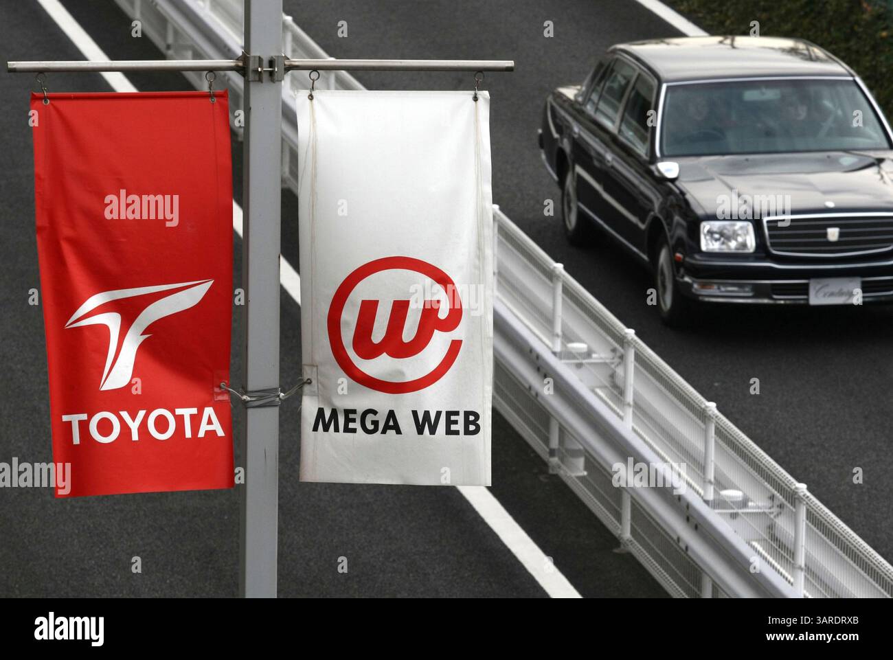 Jan 28, 2010 - Tokyo, Japan -Visitors walk by a car at a Toyota ...