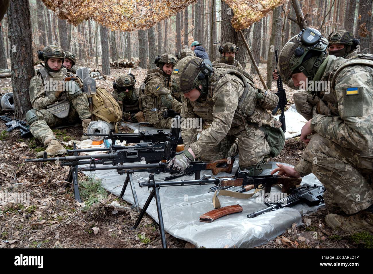 Servicemen practise to assemble and disassemble weapons during the ...
