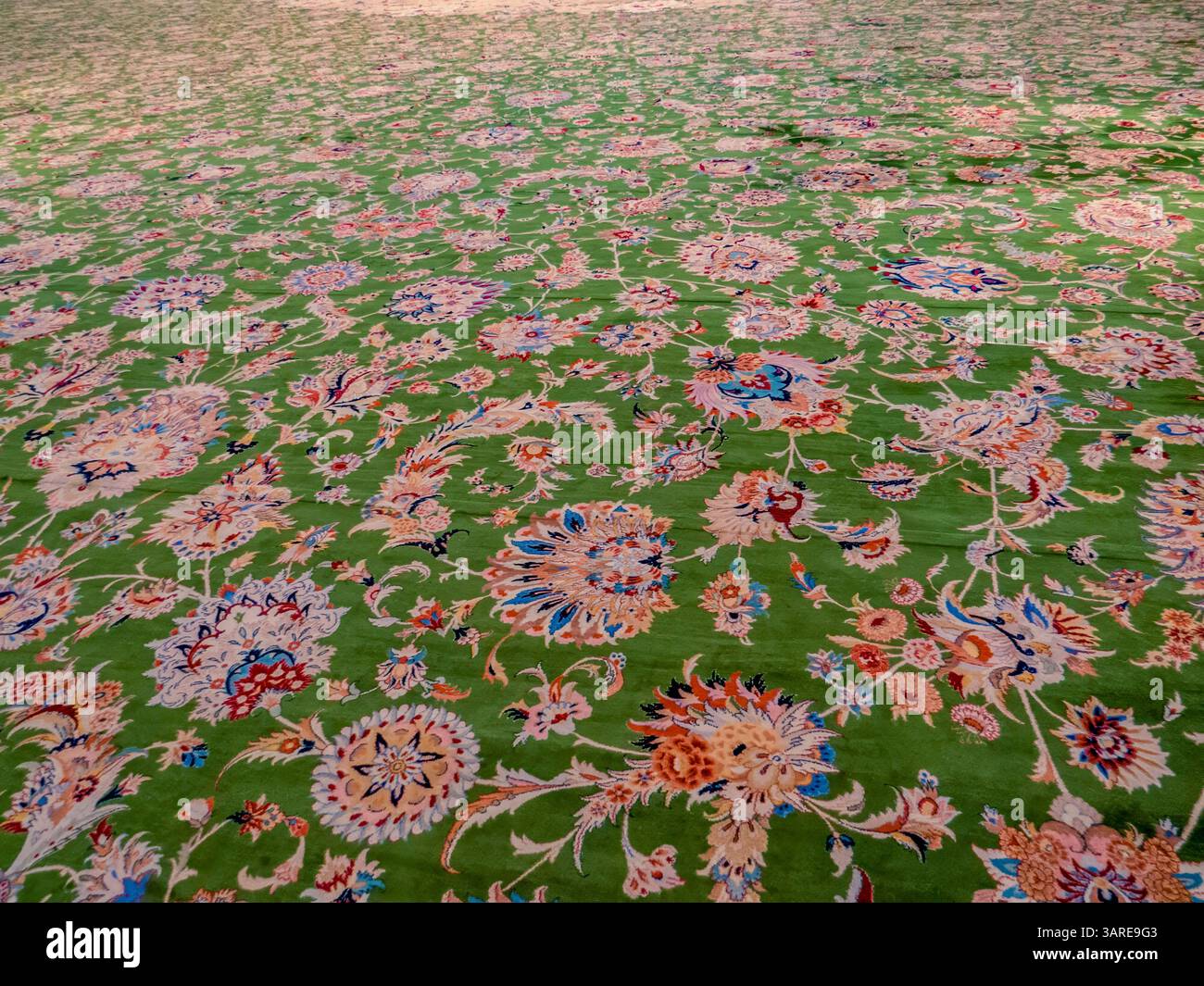 ABU DHABI, UAE. The Persian carpet in the Sheikh Zayed Grand Mosque ...