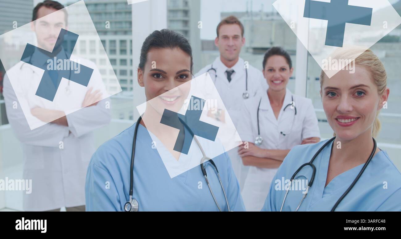 Image of diverse doctors over cross icons Stock Photo - Alamy