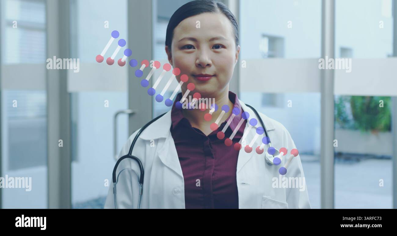 Image of asian female doctor smiling over dna strand Stock Photo - Alamy