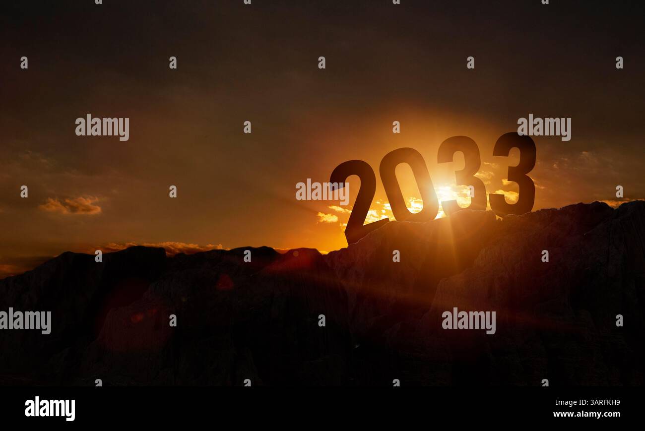 Silhouette of number 2033 on mountain, Happy New Year celebration shiny ...