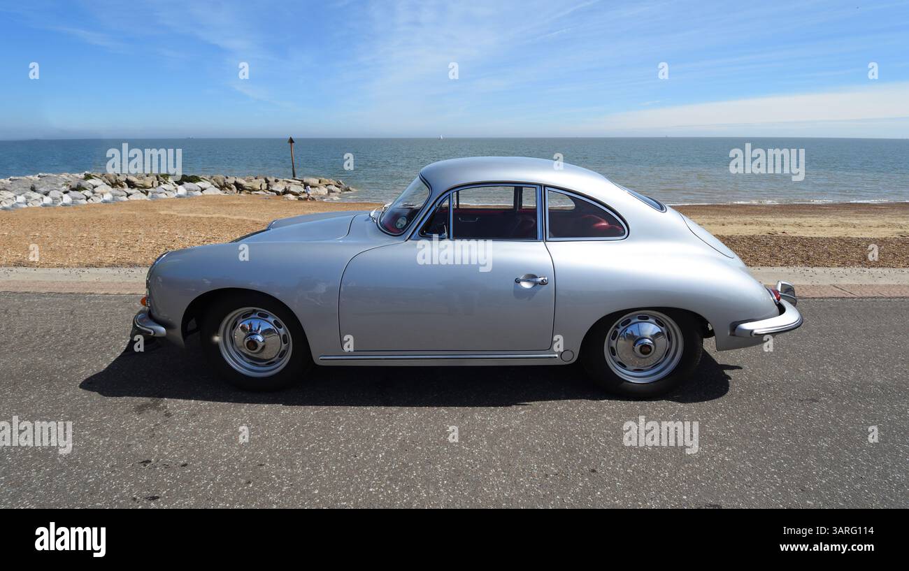 Classic Porsche 356 Coupe automobile parked on seafront promenade with ...