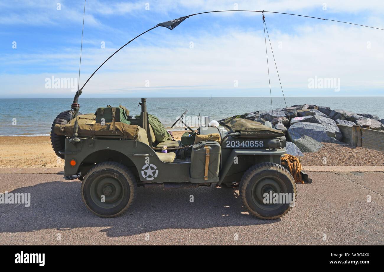 Classic 1942 Ford GPW Willys Jeep parked on seafront promenade beach ...