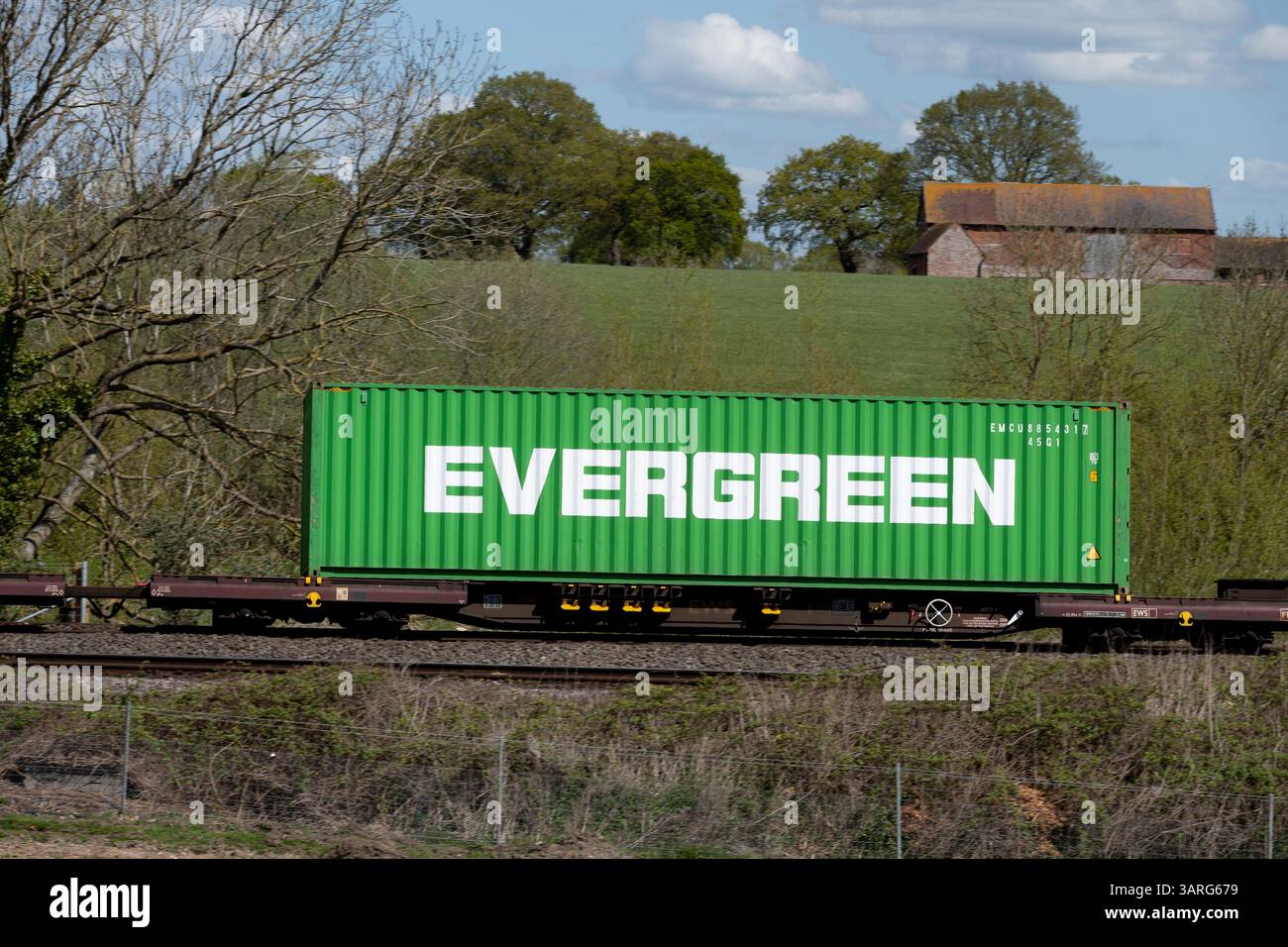 Evergreen shipping container on a freightliner train, Warwickshire, UK ...