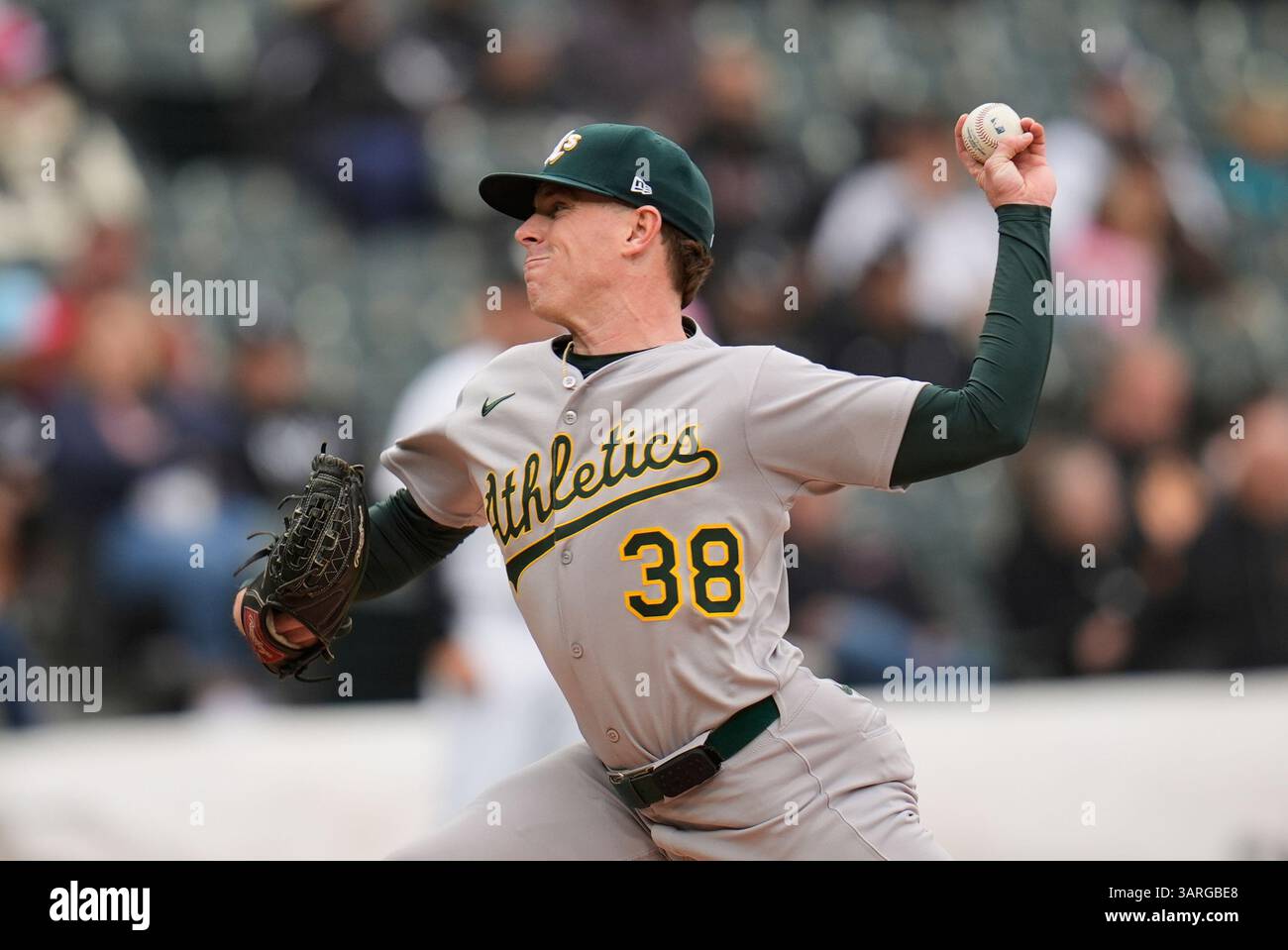 Athletics starting pitcher JP Sears (38) throws against the Chicago ...