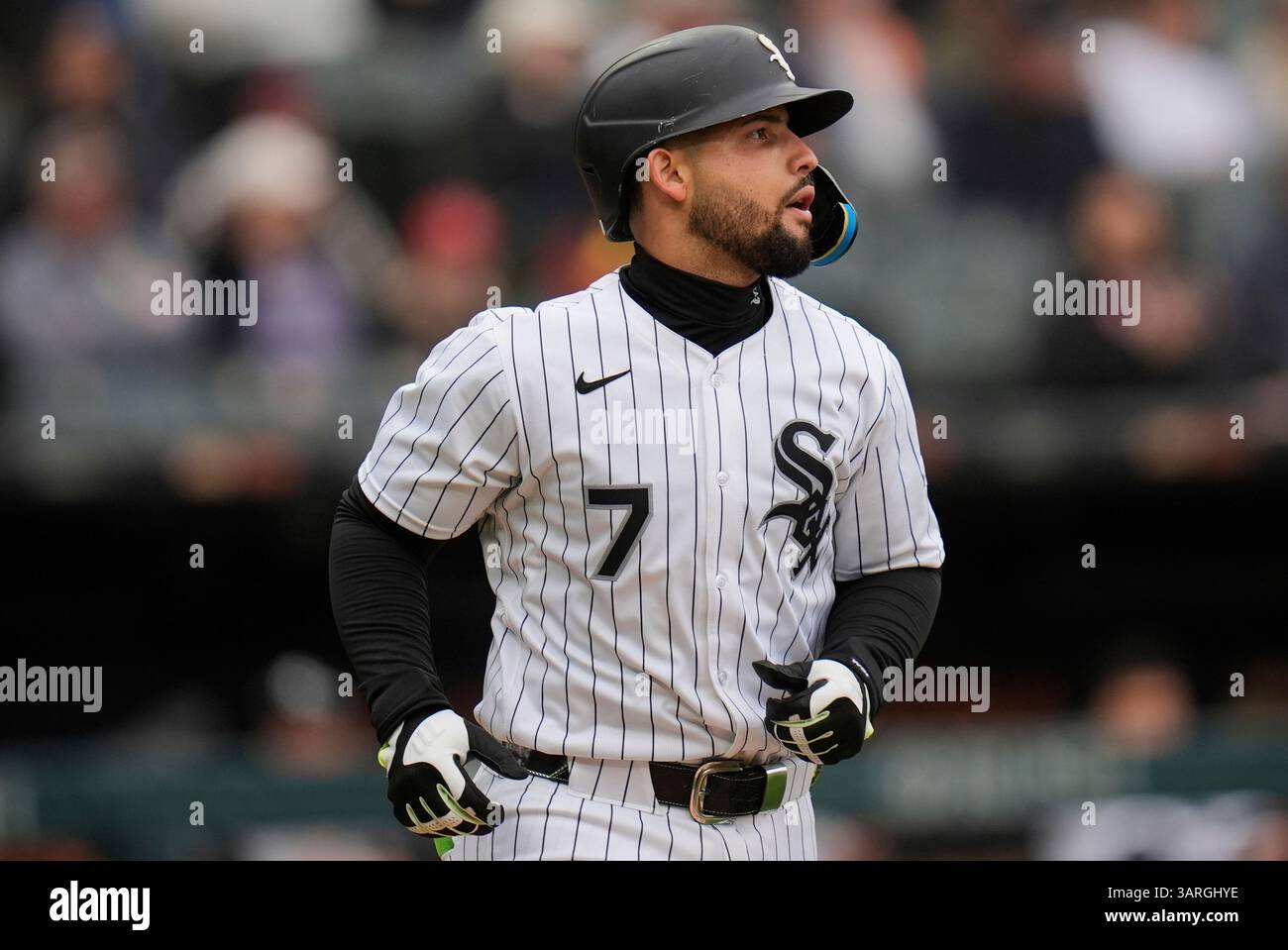 Chicago White Sox's Edgar Quero is walked during the second inning of a ...