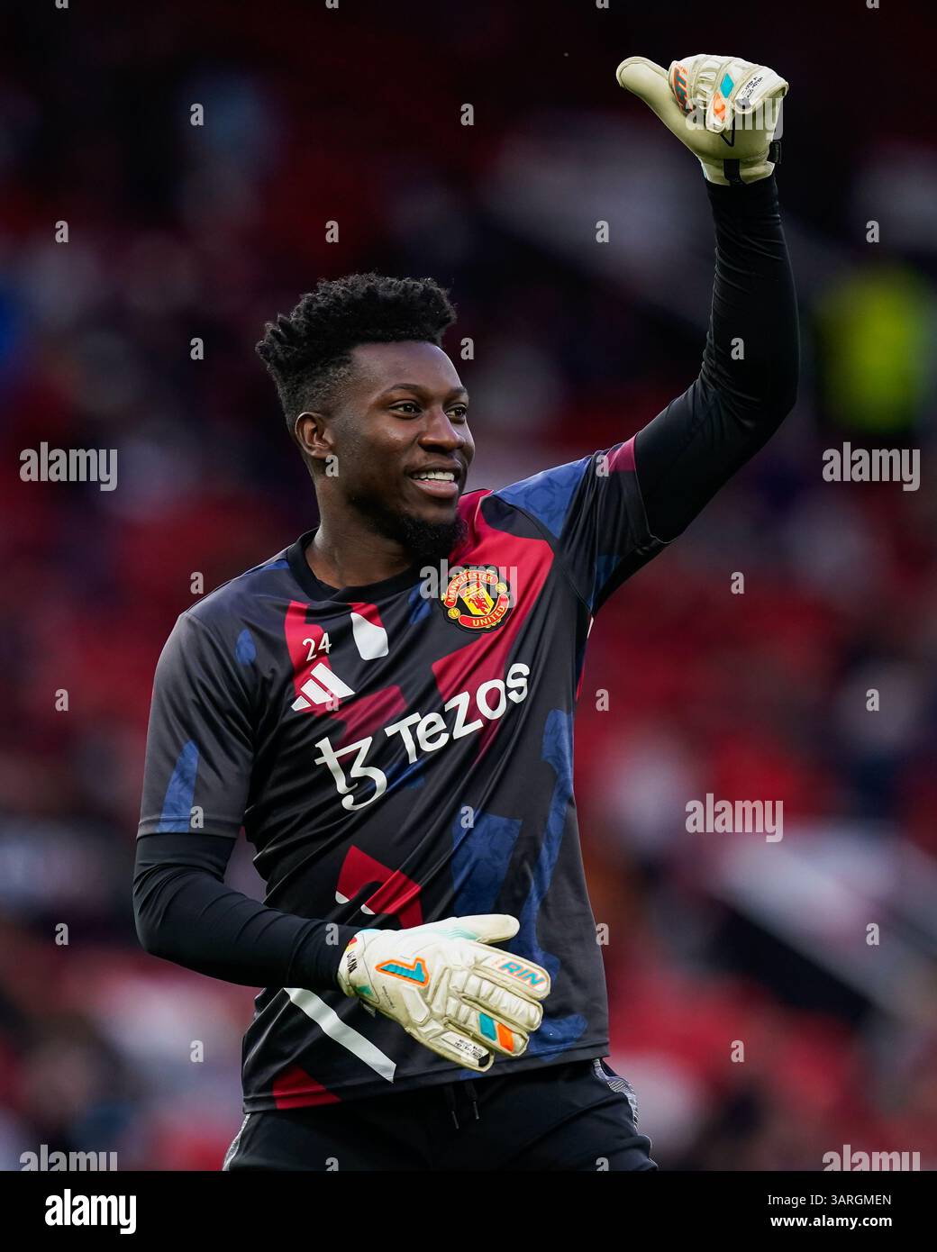 Manchester, UK. 17th Apr, 2025. André Onana of Manchester United gives ...