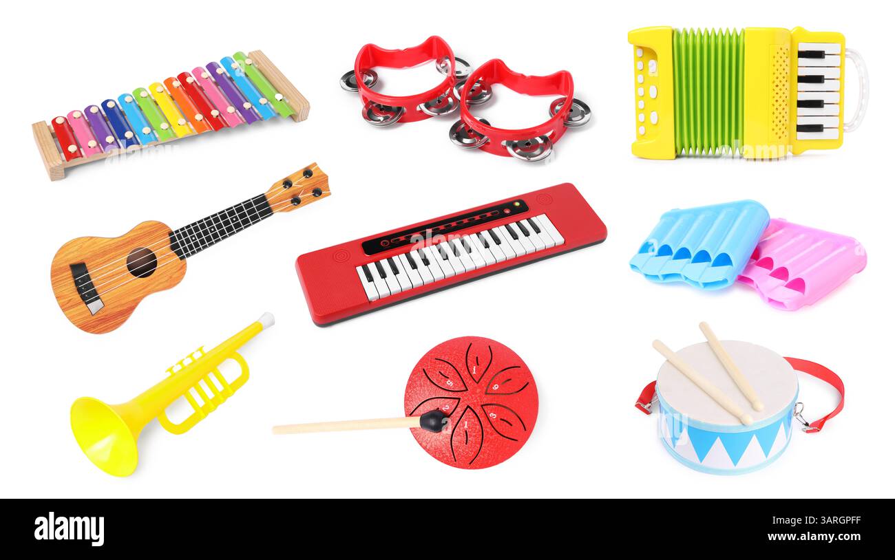 Different toy musical instruments for children on white background ...