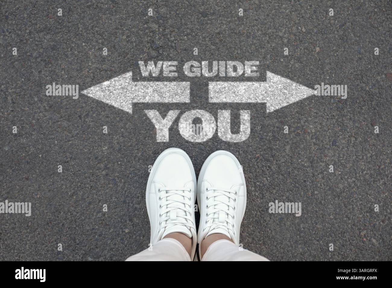 Woman standing in front of text We Guide You and arrows pointing in ...