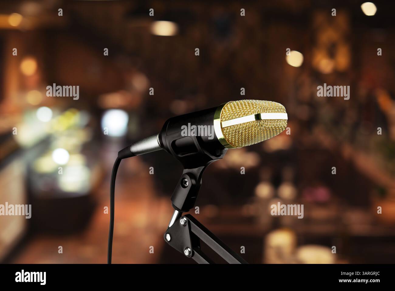 Microphone on stage in restaurant. Singer's performance Stock Photo - Alamy