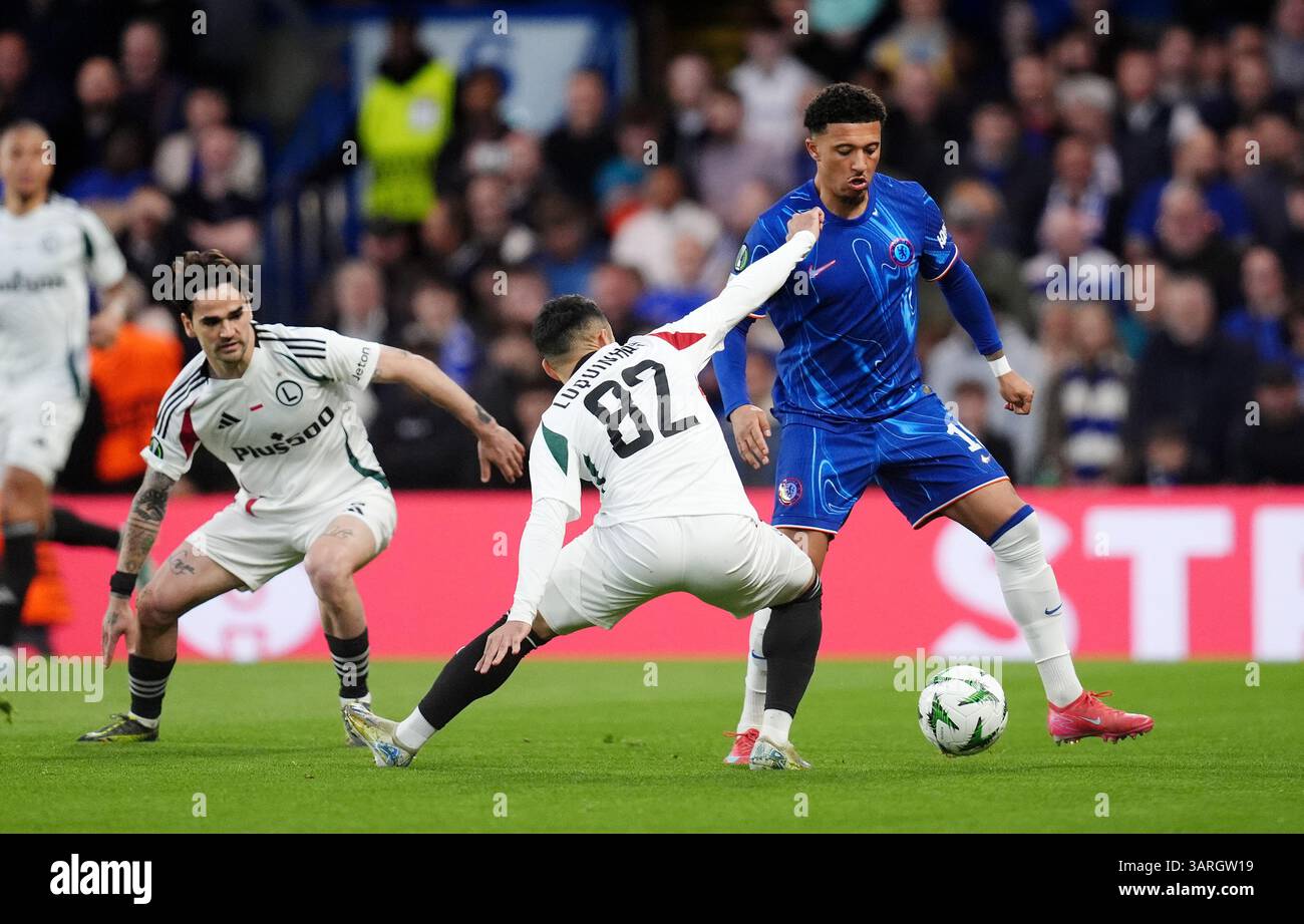 Chelsea's Jadon Sancho (right) and Legia Warsaw's Luquinhas battle for the ball during the UEFA ...