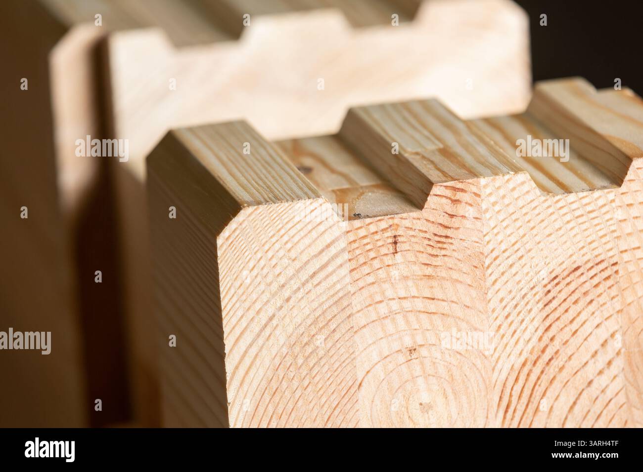Close up of a glued pine wood timbers. Ecological and fast construction ...