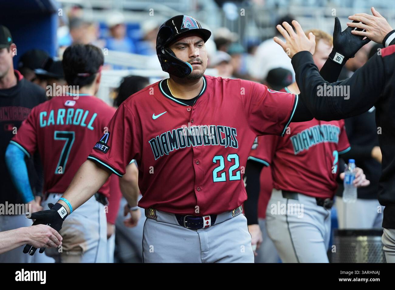 Arizona Diamondbacks' Josh Naylor (22) is congratulated after hitting a ...