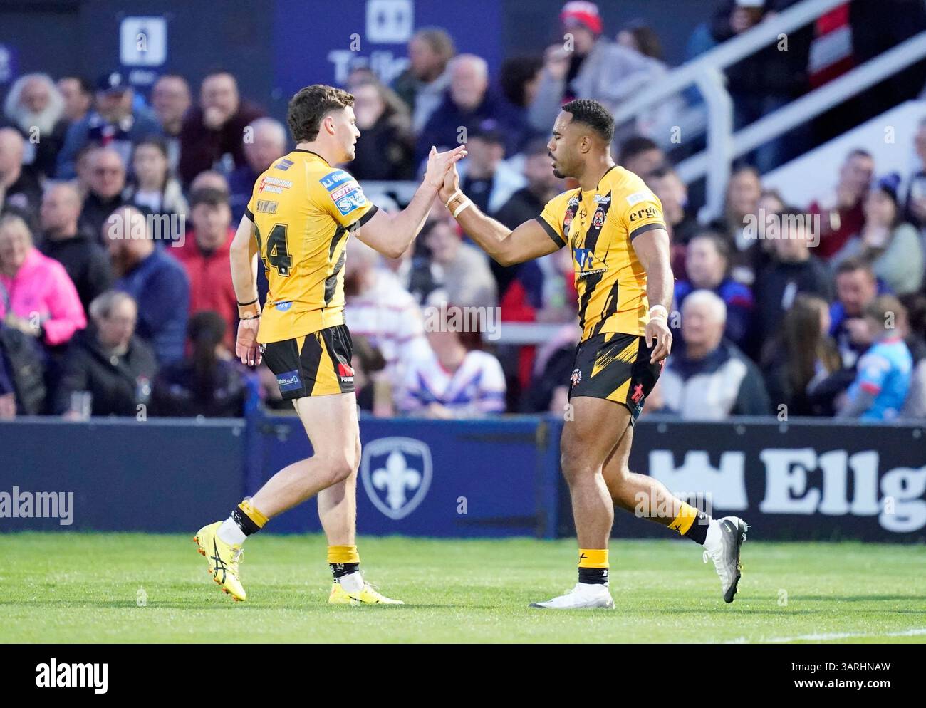 Castleford's Jason Qareqare (right) celebrates a try with his team mate ...