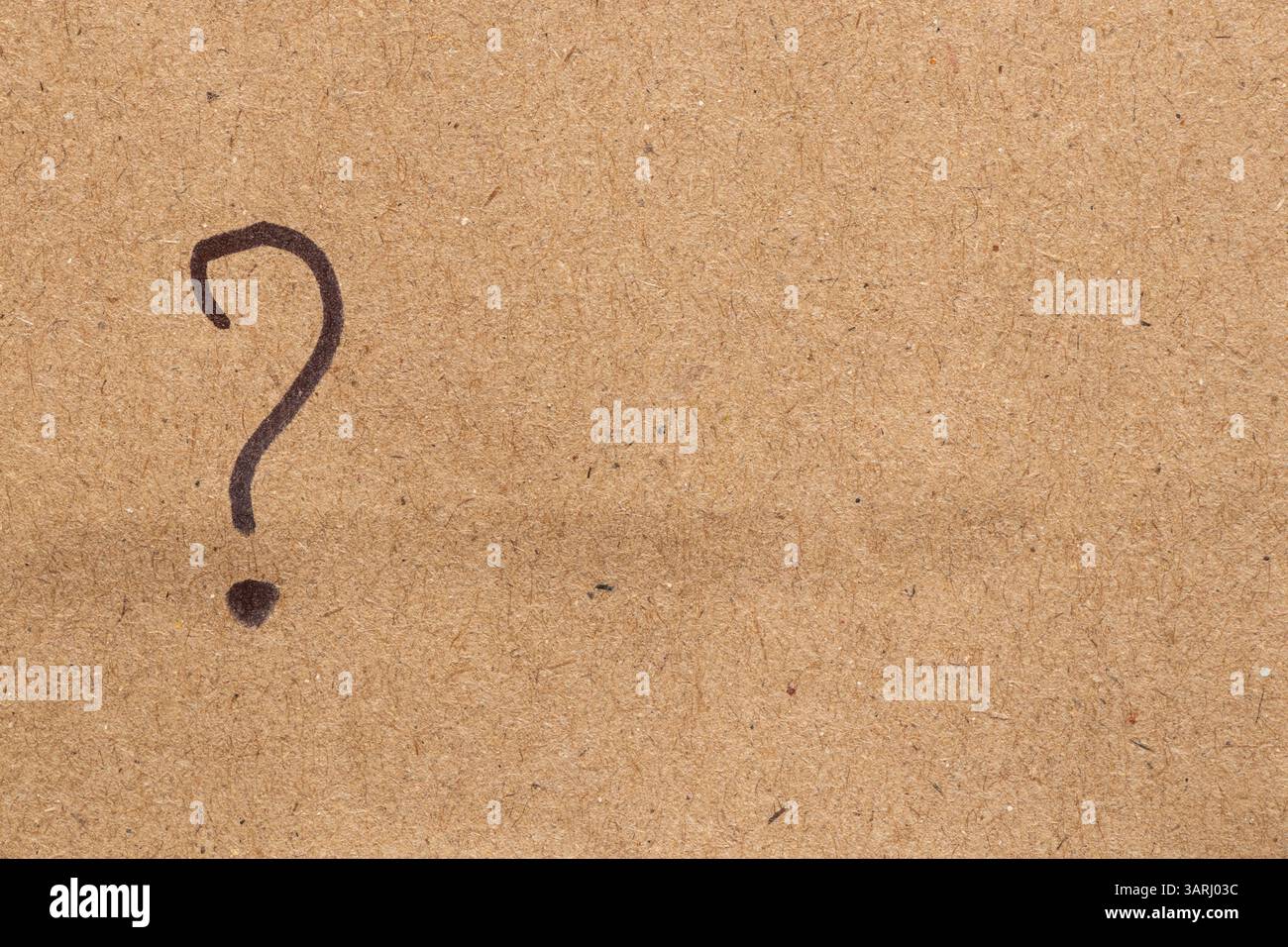 A question mark is drawn on brown paper as a background Stock Photo - Alamy