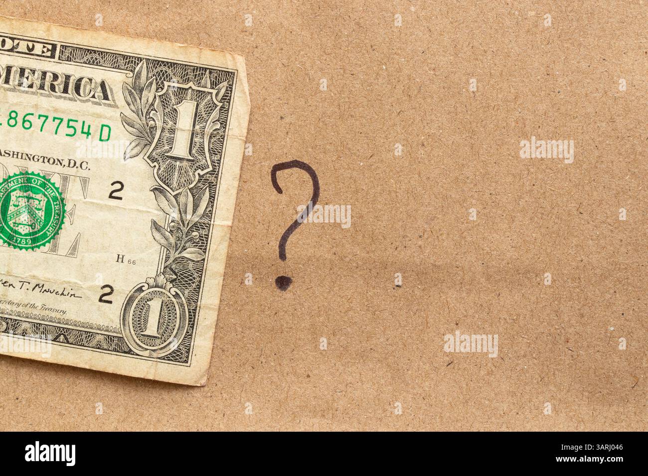 A drawn question mark and one dollar lie on brown paper, ask Stock ...