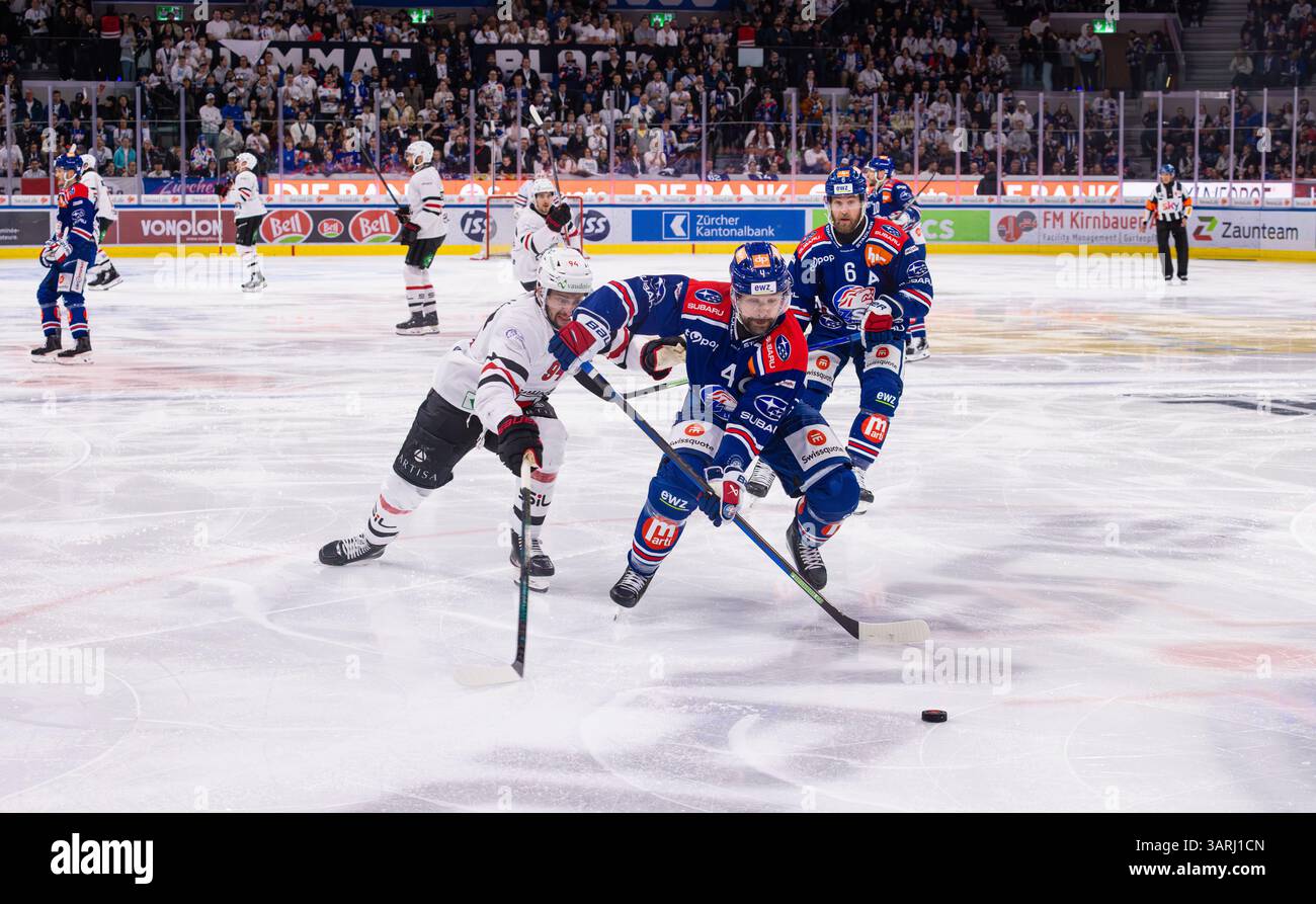 Zurich, Switzerland, 17th Apr 2025: Duel for the puck between defender ...