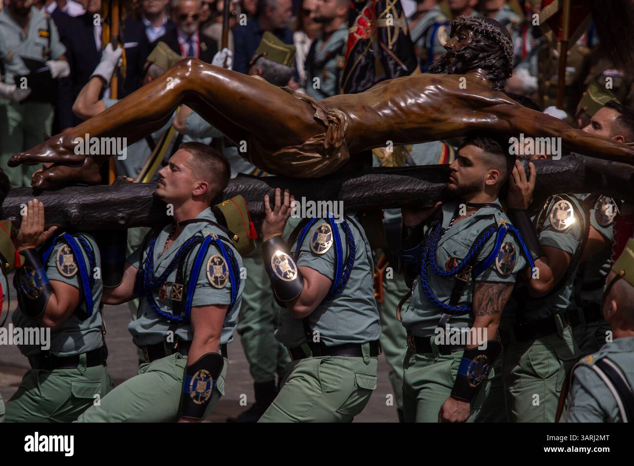 Malaga, Spain. 17th Apr, 2025. A group of legionnaires carry the Christ ...