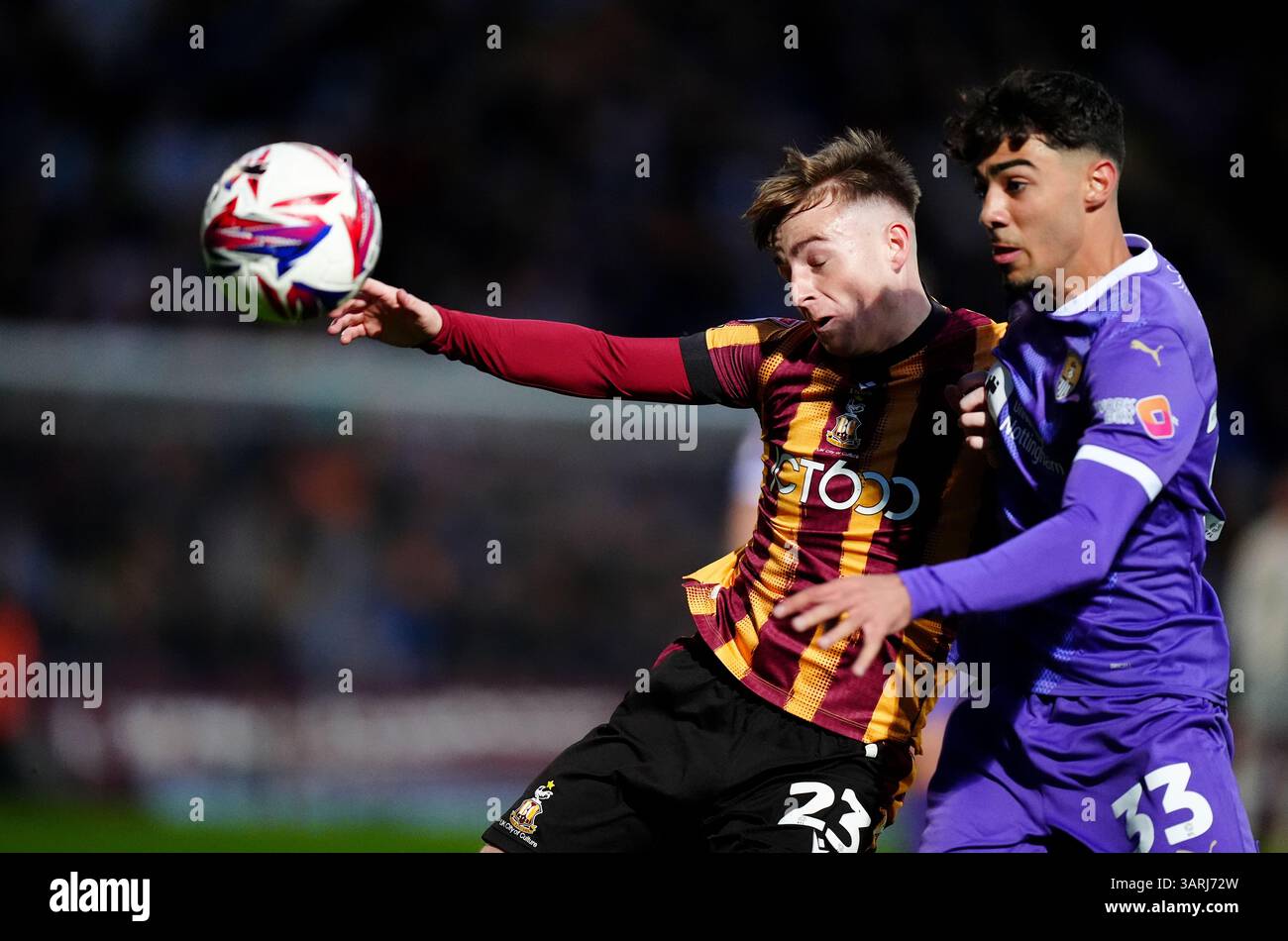 Bradford City's Bobby Pointon (left) and Notts County's George Abbott ...