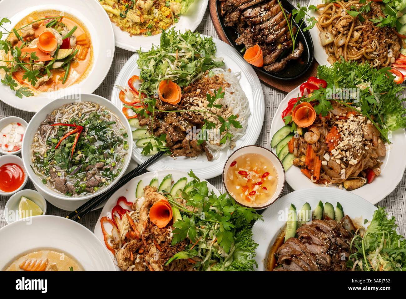 assortment of mixed popular traditional vietnamese food dishes on ...