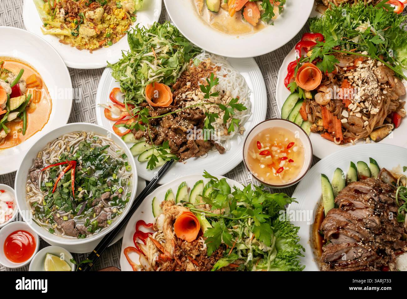 assortment of mixed popular traditional vietnamese food dishes on ...