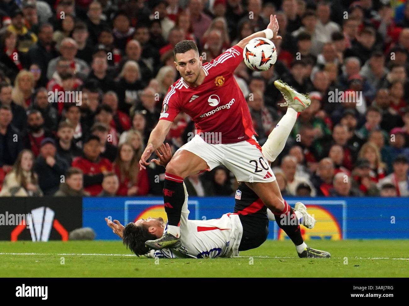 Manchester United's Diogo Dalot wins the ball before scoring their side ...