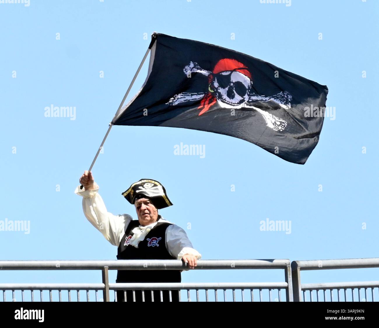 Pittsburgh, United States. 17th Apr, 2025. A fan waves the Jolly Roger ...