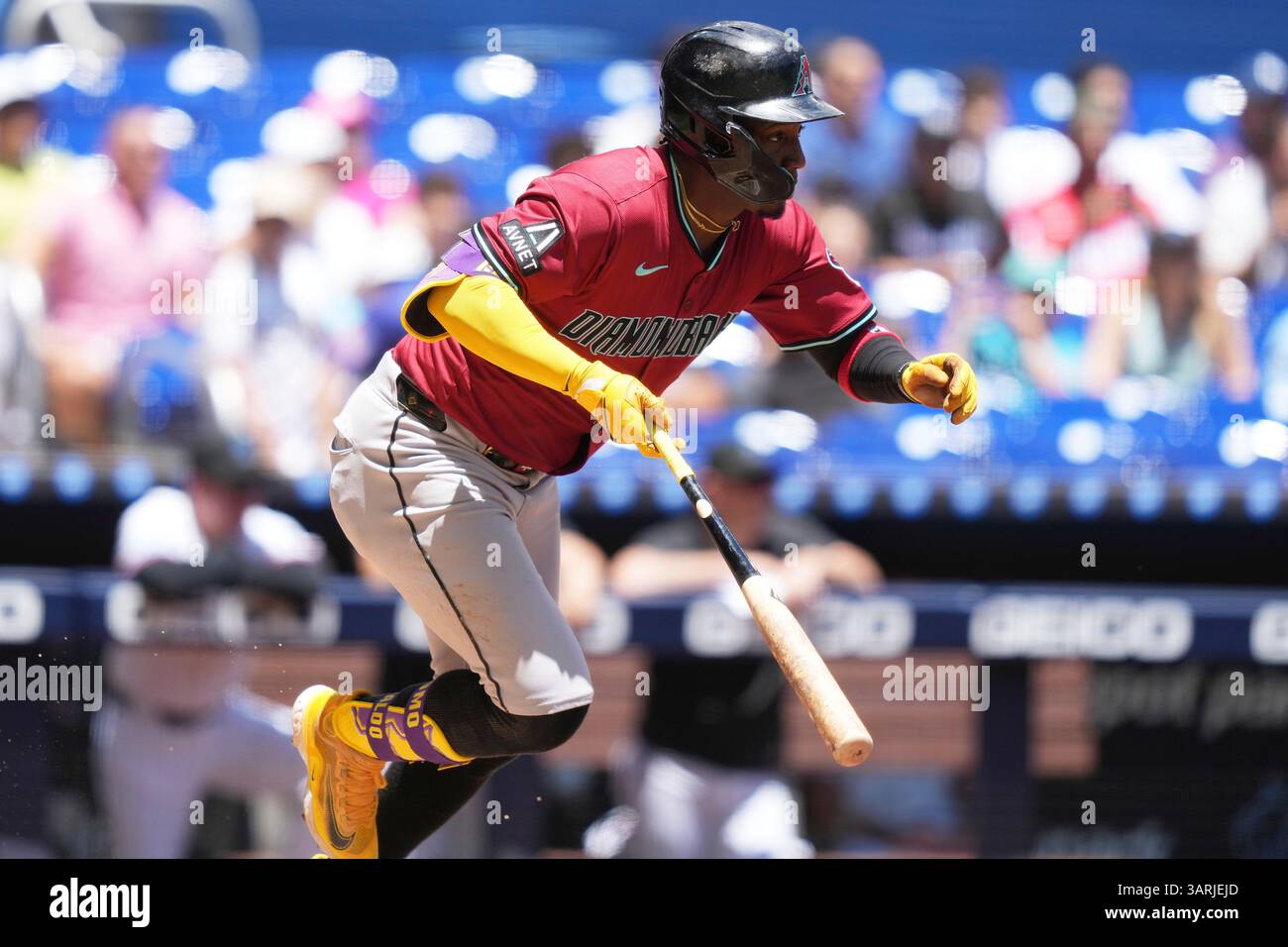 Arizona Diamondbacks' Geraldo Perdomo runs after hitting a single ...