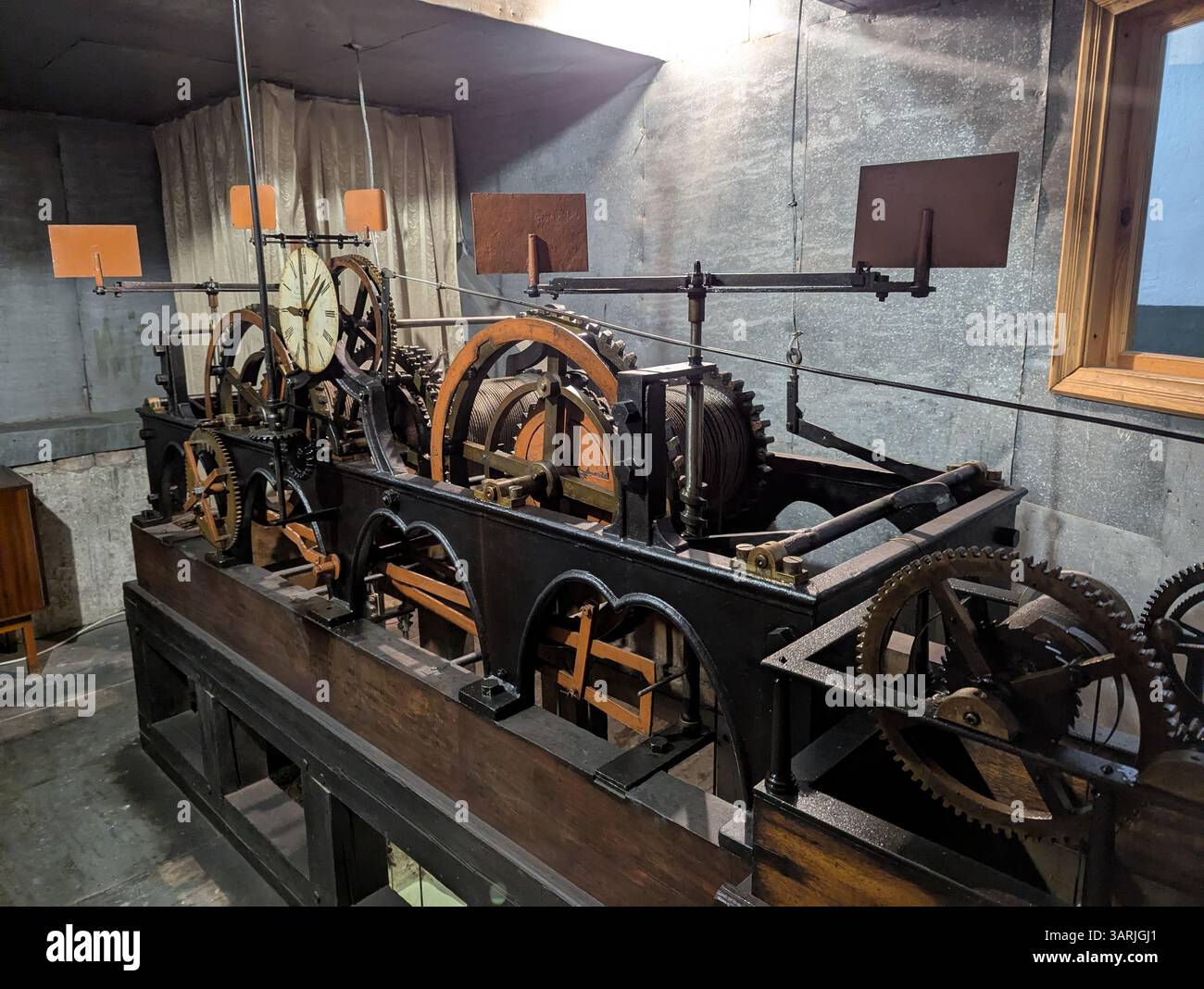 Intricate clockwork mechanism of an antique tower clock, showcasing ...