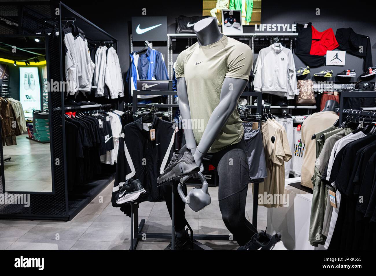 Khmelnytskyi, Ukraine - April 16, 2025: Modern sporty Nike apparel showcase in a contemporary ...