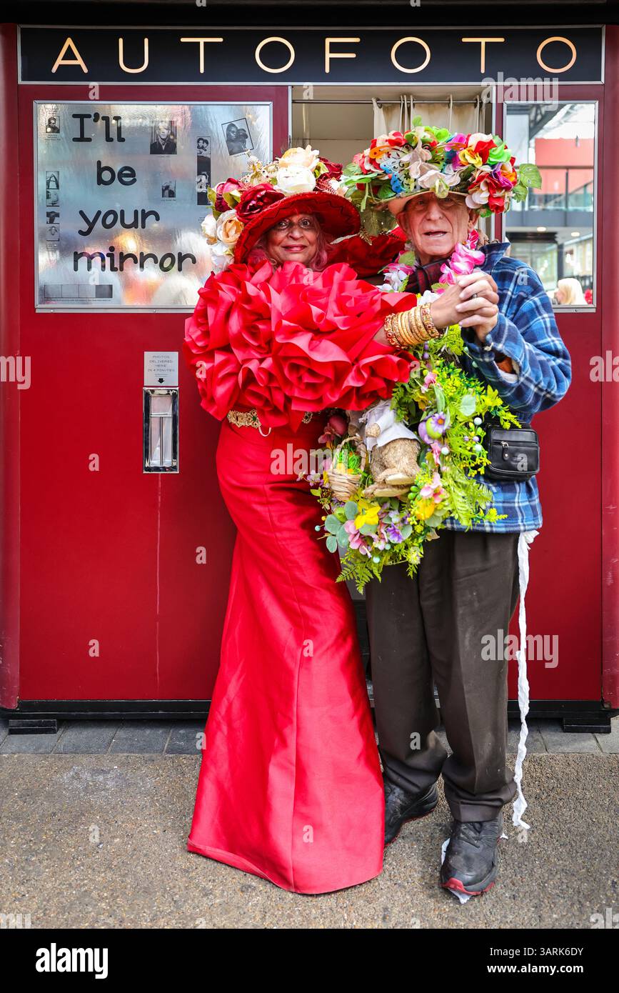 London, UK. 17th Apr, 2025. two participants pose with a photo booth in ...