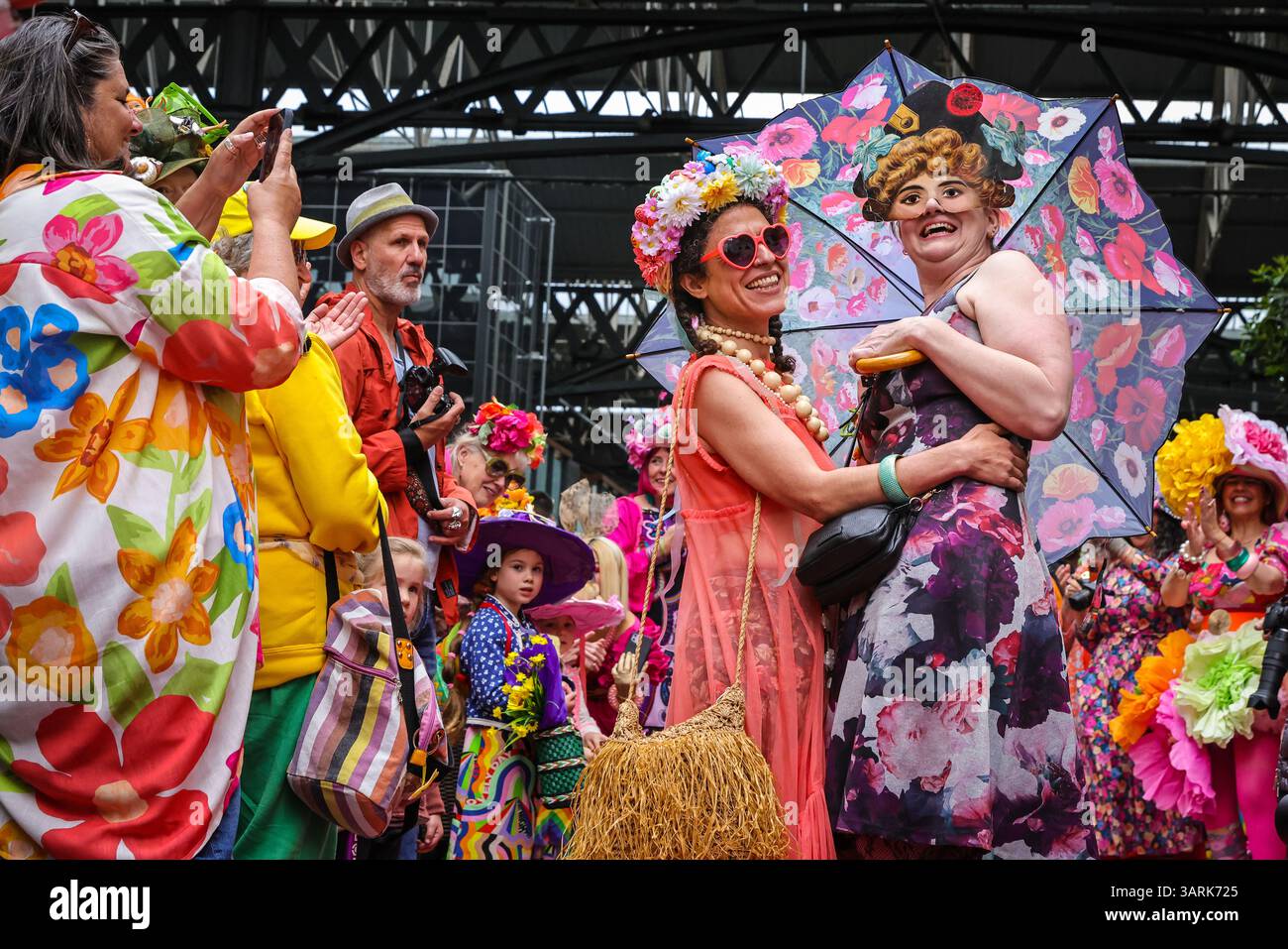 London, UK, 17th April 2025. Participants show off their colourful ...