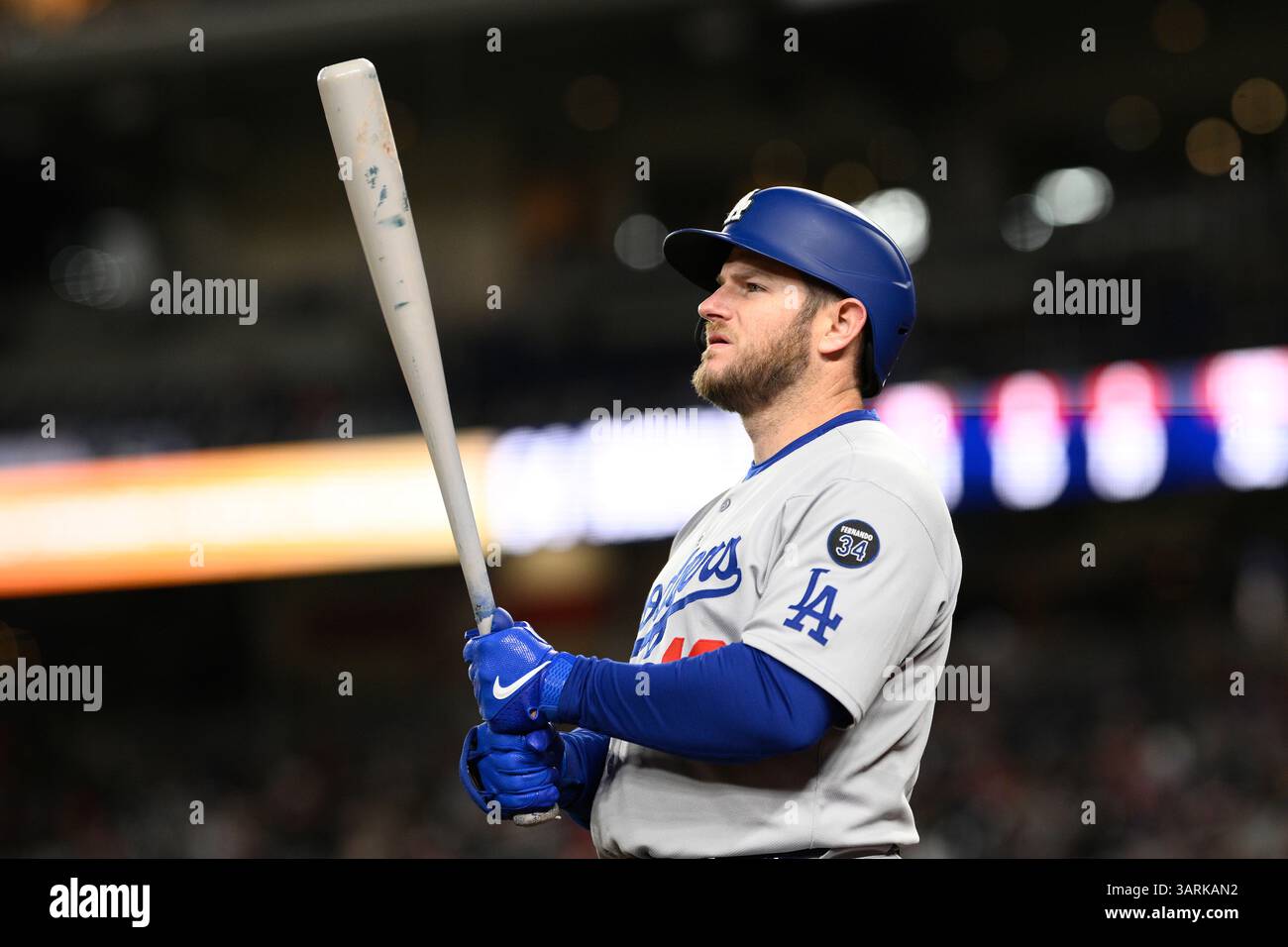 Los Angeles Dodgers' Max Muncy looks on during a baseball game against ...