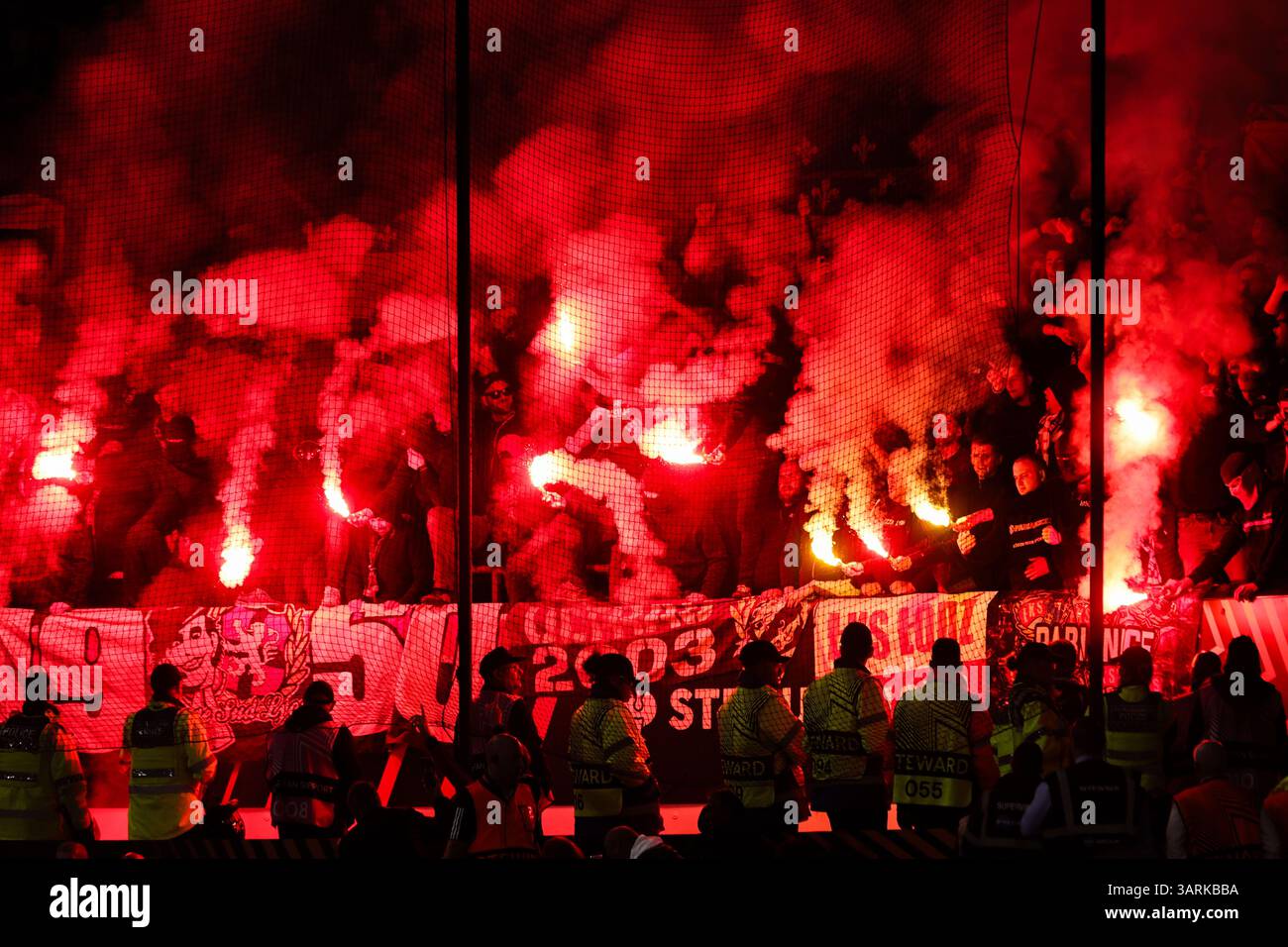 Manchester, UK. 17th Apr, 2025. Lyon fans use pyrotechnics during the ...
