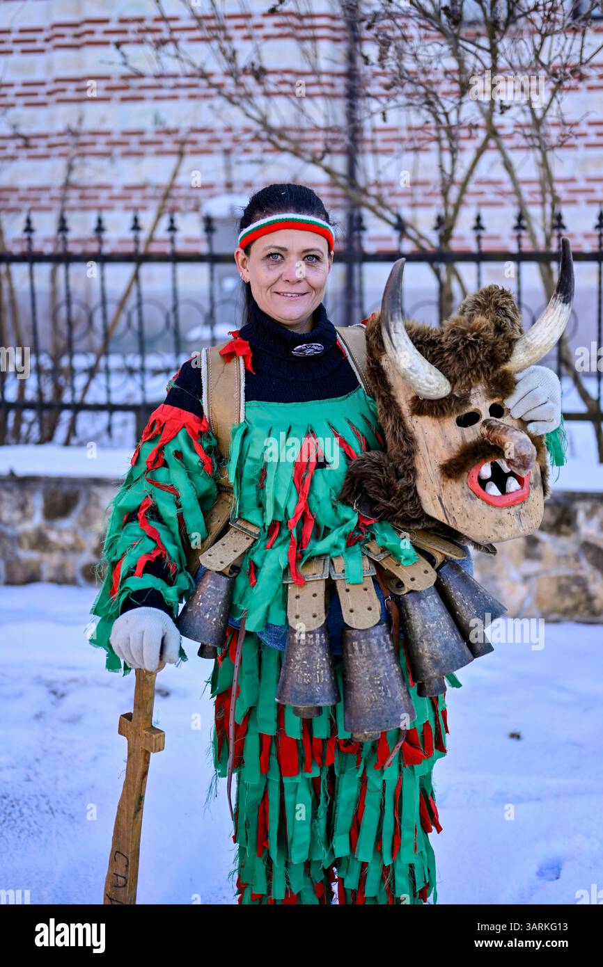 This striking portrait captures a Kuker wearing a traditional hand ...