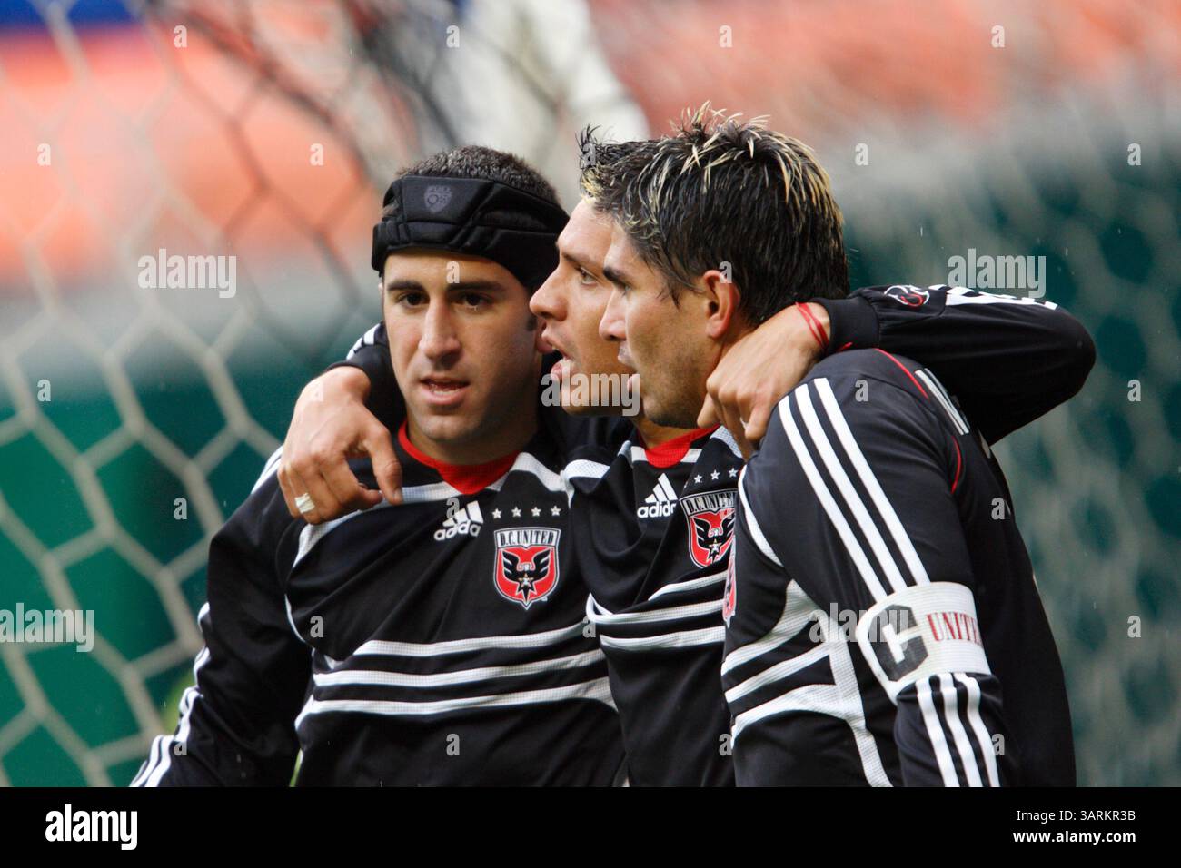 Alecko Eskandarian, Christian Gomez and Jaime Moreno (L-R) celebrate ...