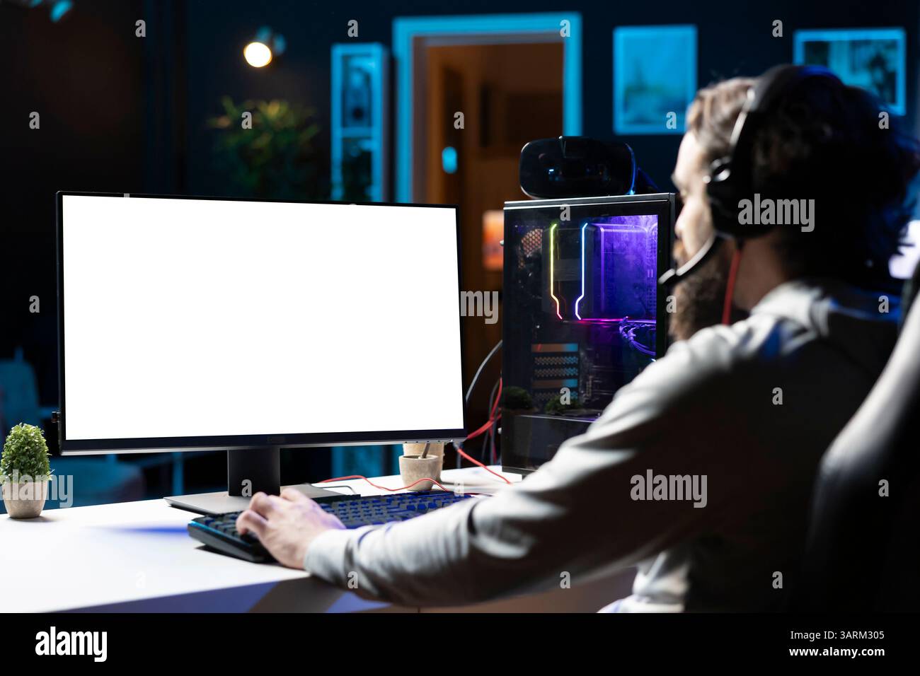 Man using gaming station mockup monitor, excited to finally relax by ...